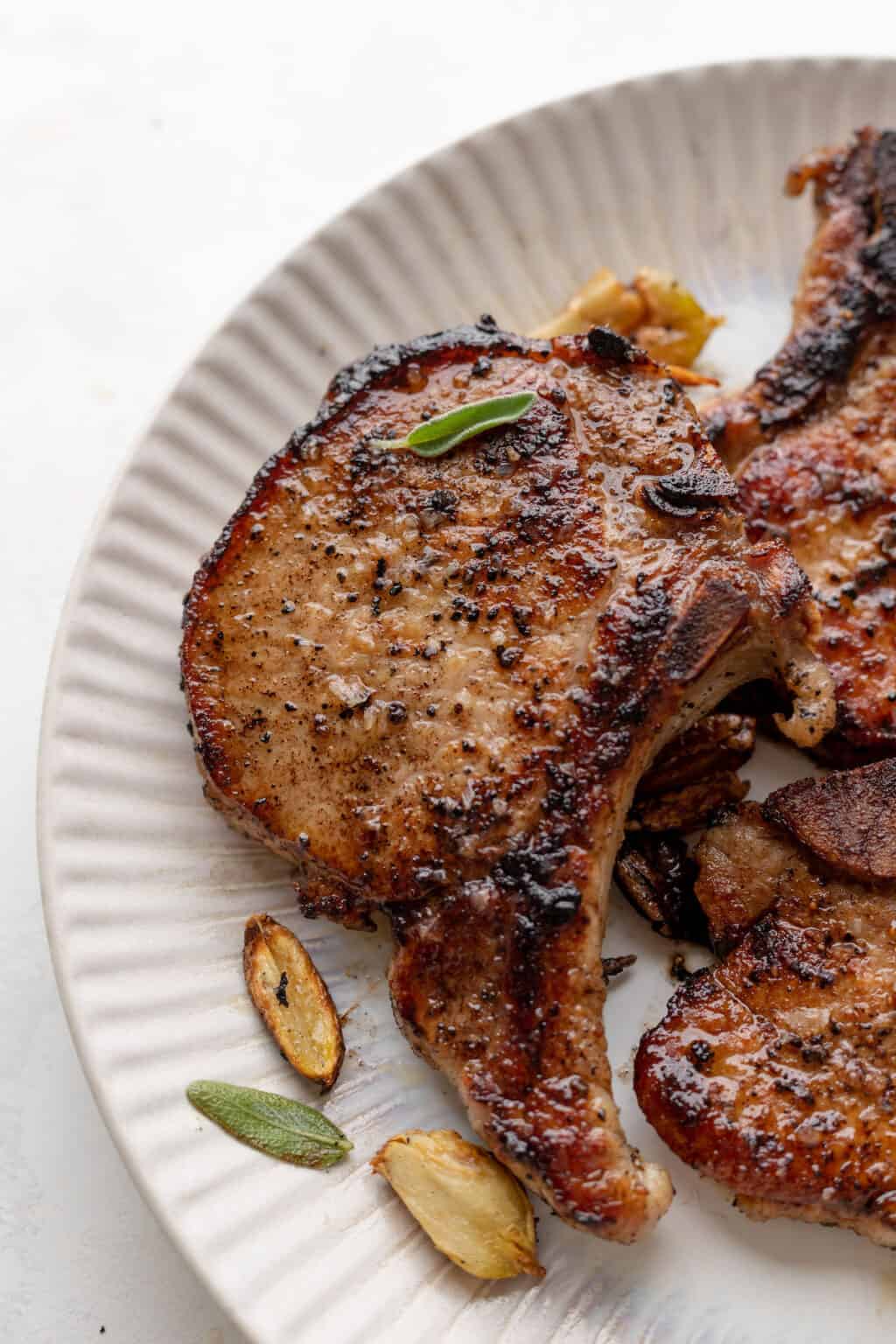 Juicy Brined Pork Chops with Garlic & Sage - Well Seasoned Studio