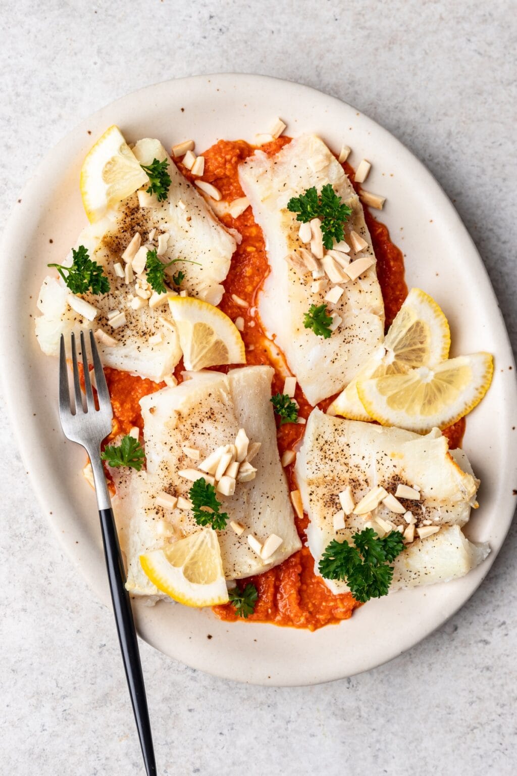 Easy Pan Seared Cod with Romesco Sauce - Well Seasoned Studio