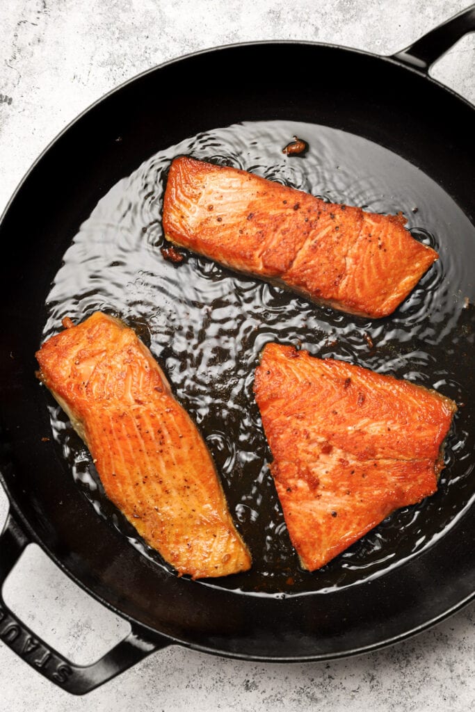 25-Minute Pan-Seared Trout with Creamy Pesto Sauce - Well Seasoned Studio