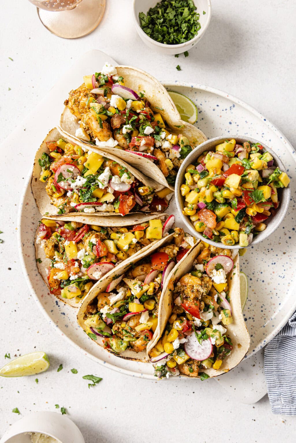 Juicy Chipotle Shrimp Tacos with Mango Corn Salsa - Well Seasoned Studio
